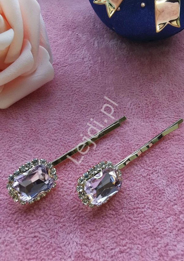 Elegancka złota spinka z kamieniami